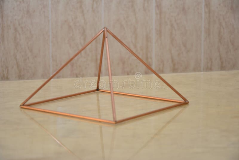 Hollow Copper Pyramid with Blurred Background. Selective Focus. Zoom ...