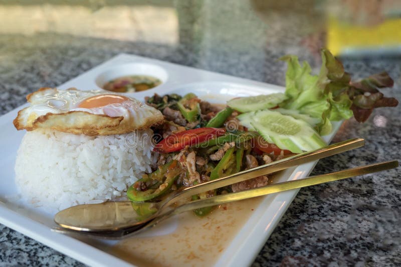 Holy Basil Fried Rice with Beef and Fried Egg Stock Image - Image of ...