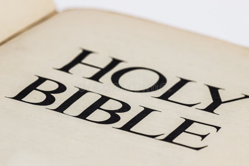 Holy Bible on a Brown Paper Over the White Wall. Stock Image - Image of ...