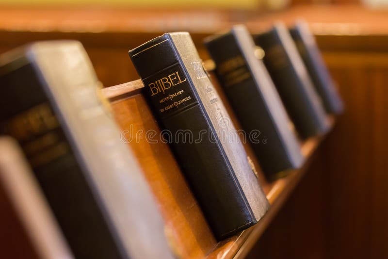 The Holy Bible in church editorial stock image. Image of songs - 83244139