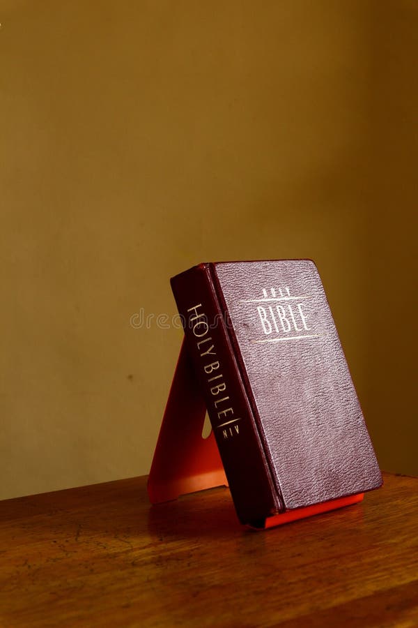 Holy Bible on a table stock image. Image of scripture - 156525171