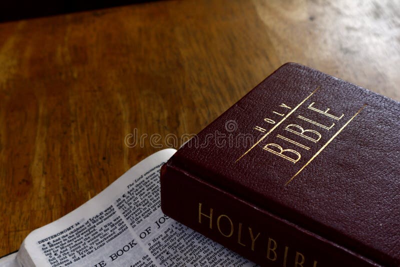Holy Bible on a table stock image. Image of scripture - 156525171