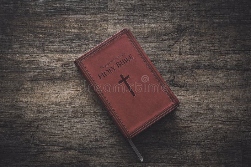 Holy Bible on a Wooden Table Stock Photo - Image of holy, christianity ...