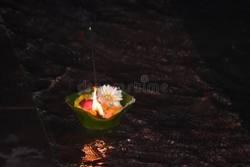 Holy Bowl with Candle in River Stock Image - Image of lighting, plant ...