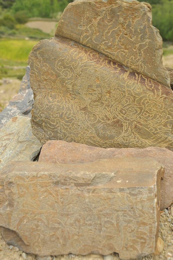 Carved Stones with Tibetan Script "Om Mani Padme Hum" in Ladakh, INDIA ...