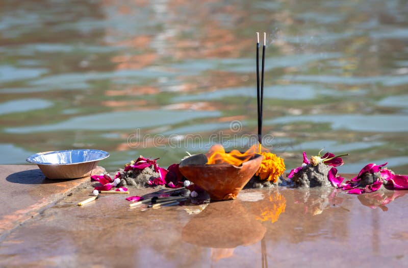 Holy Offerings by Devotee at Religious River Shore at Morning from Flat ...