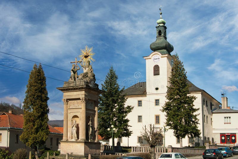 The Holy Trinity Classicist Column in Nova Bana with Town Hall Museum ...