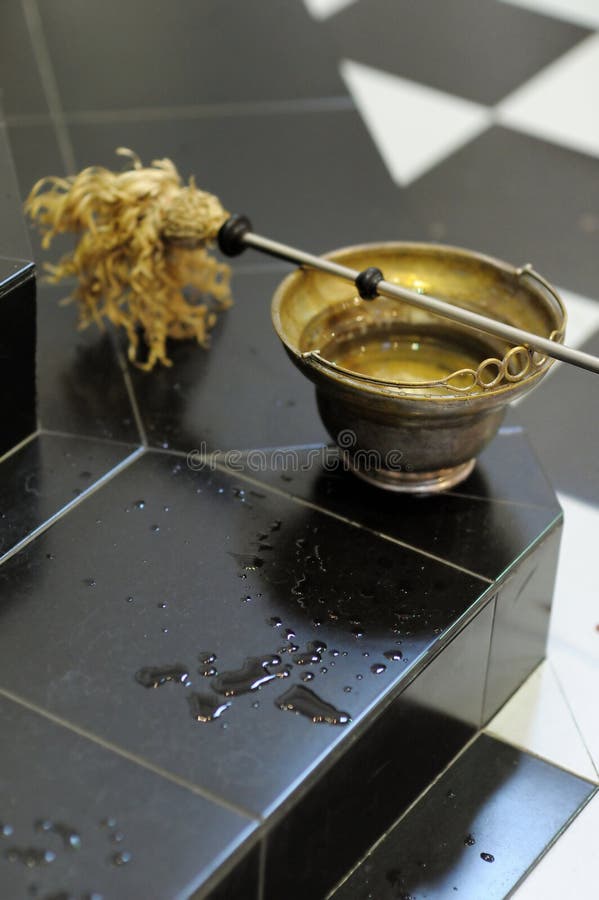 Holy water and sprinkler stock photo. Image of religion - 13241096