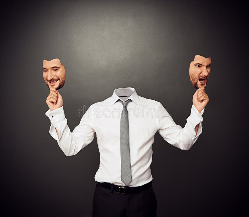 Hombre Anónimo Que Lleva a Cabo Máscaras Foto de archivo - Imagen de ...