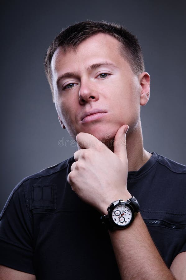 Hombre con el reloj foto de archivo. Imagen de lujoso - 26418334