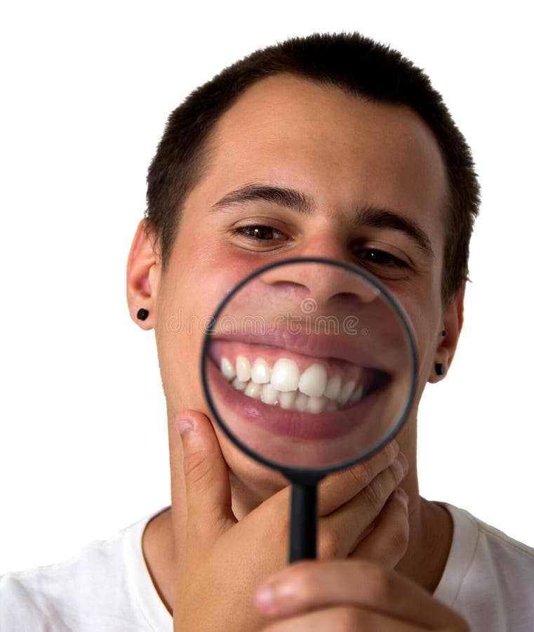 Hombre con la lupa imagen de archivo. Imagen de dientes - 33598733