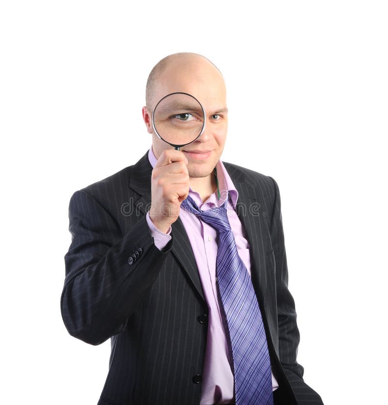 Hombre con magnificar imagen de archivo. Imagen de humor - 13956633