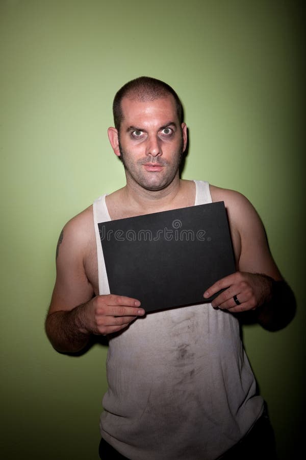 Hombre Con Sonrisa Torcida En Mugshot Foto de archivo - Imagen de ...