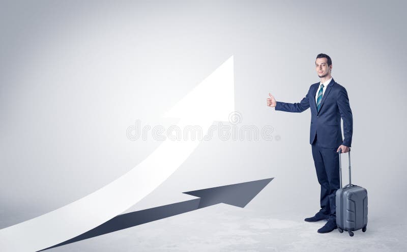 Hombre De Negocios Que Hace Autostop Con La Flecha Progresiva Foto de ...