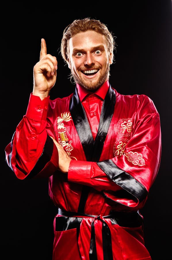 Hombre en un traje rojo imagen de archivo. Imagen de aislado - 24628149