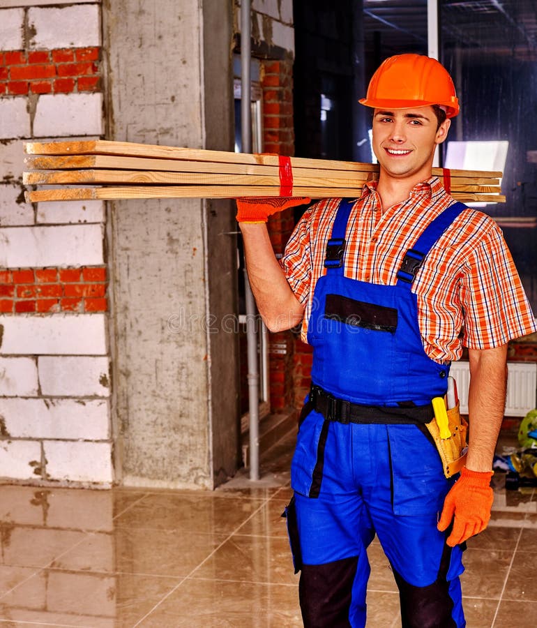 Hombre En Uniforme Del Constructor Imagen de archivo - Imagen de ...