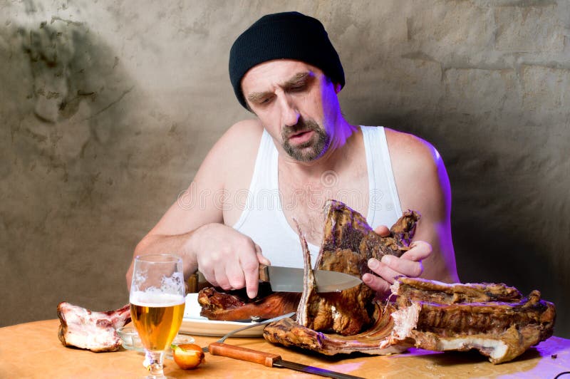 Hombre hambriento foto de archivo. Imagen de coma, cerdo - 19027370