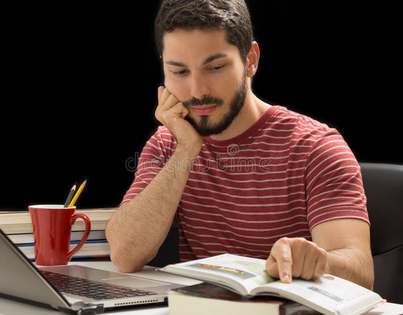 Hombre Joven Que Estudia Solo Foto de archivo - Imagen de negro ...