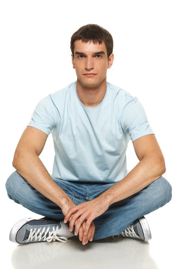 Hombre Serio Que Se Sienta En El Suelo Foto de archivo - Imagen de ...