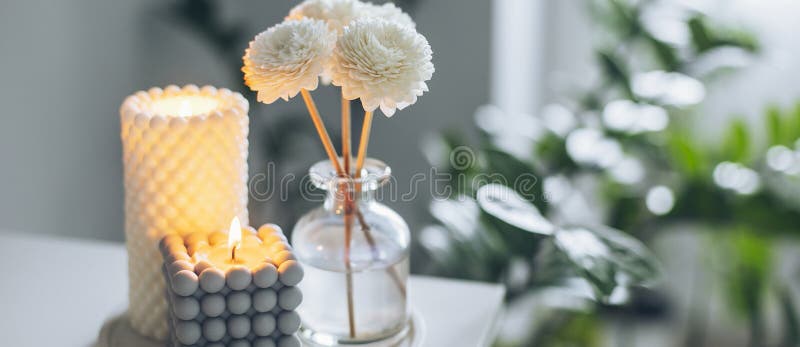 Home Aroma Fragrance Diffuser and Burning Candles on Bedside Table in ...