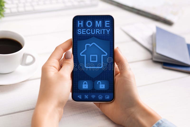 Lady Using Her Smartphone with Home Security Application Stock Image ...