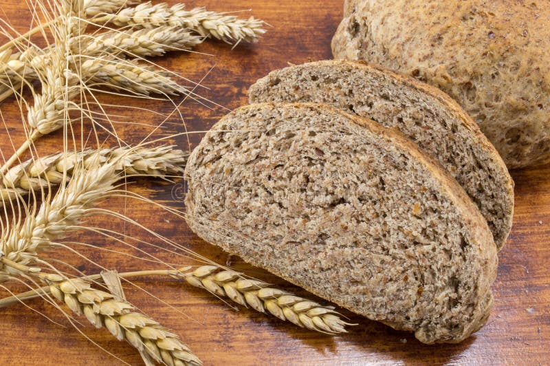 Home Baked Brown Bread Slices on the Table Stock Image - Image of ...