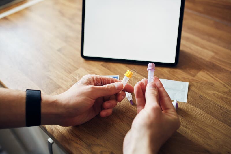 Home Blood Test Kit with Blank Screen on a Digital Tablet Stock Photo ...
