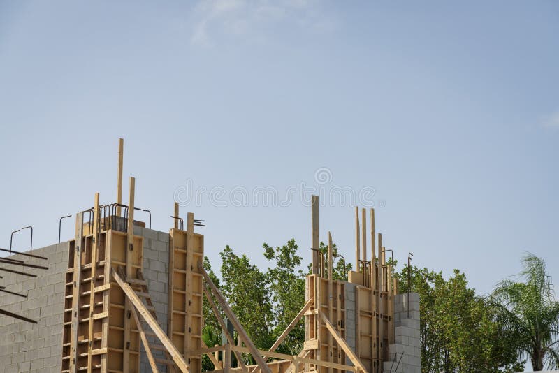 Home Construction with Concrete Blocks and Column Timber Formwork at ...