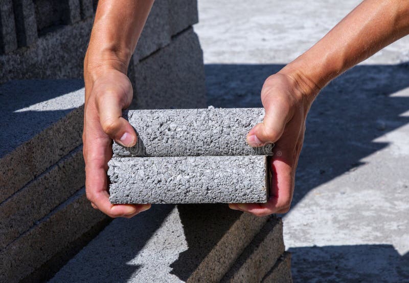 Male and Female Hands with Building Materials Stock Photo - Image of ...