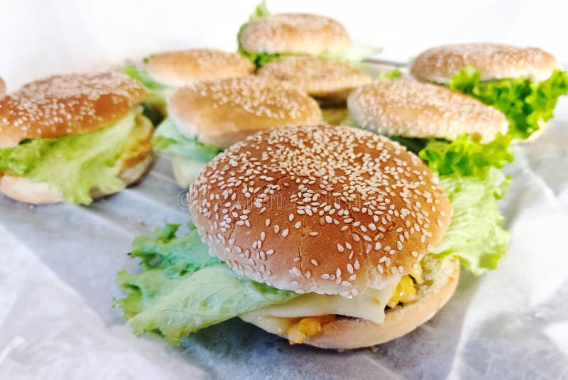 Home Cooked Burgers, Cheeseburger and Hamburger on the Table Stock ...