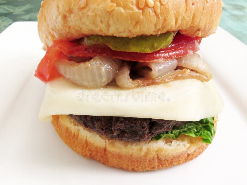 Home Cooked Fat Cheeseburger with Many Ingredients Stock Image - Image ...
