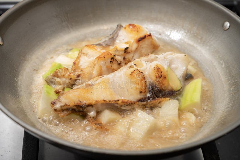 Home Cooked Fried Fish on Wok Stock Photo - Image of delicious, fish ...