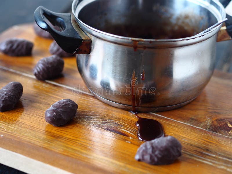 Home Cooking.Chocolate Icing in the Kitchen Pot Stock Image - Image of ...