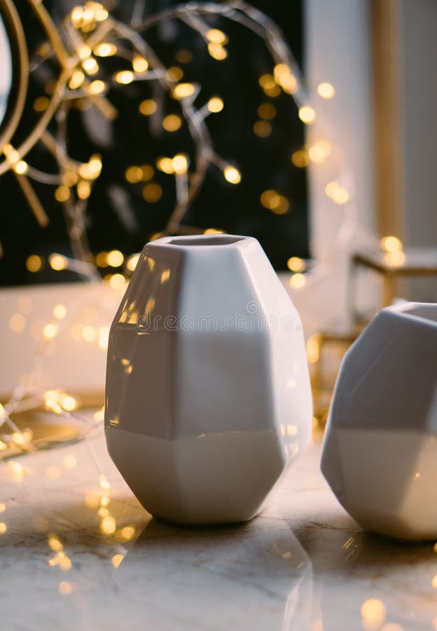 Home Decor, Ceramic Vase and String Lights on Marble Table Stock Image ...