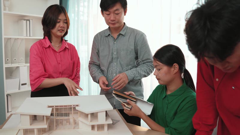 Home Designer and Client Choosing Material for Home. Variegated Stock ...