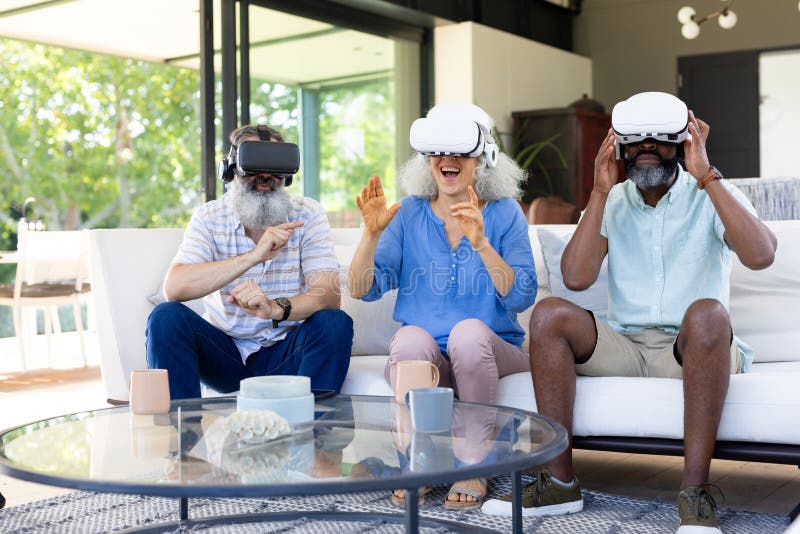 At Home, Diverse Group of Seniors Using VR Headsets, Enjoying Virtual ...