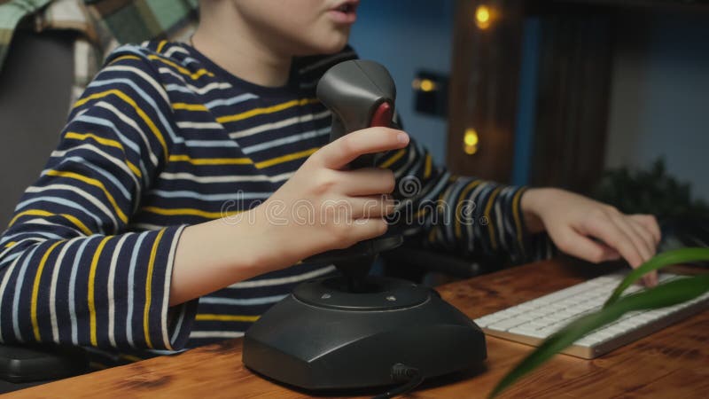 Little Gamer Boy Playing Video Game Using Flight Simulator Joystick ...