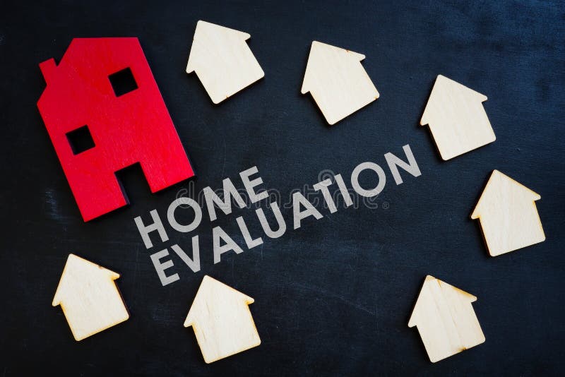 Home Evaluation Concept. Small Wooden Houses on Dark Surface. Stock ...