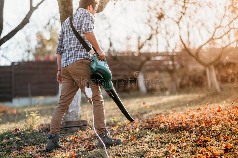 Man Using Leaf Blower Industrial Stock Photos - Free & Royalty-Free ...