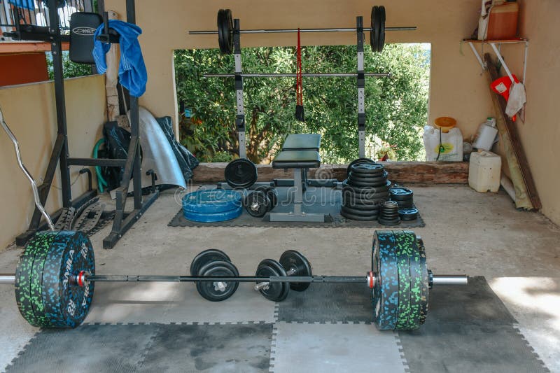 Home Gym Setup with Weight Rack, Bench, Barbells, and Dumbbells ...