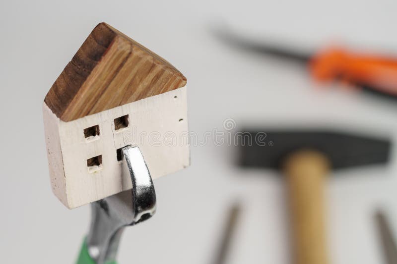 Home Improvement Concept. House Model in Wrench Stock Image - Image of ...