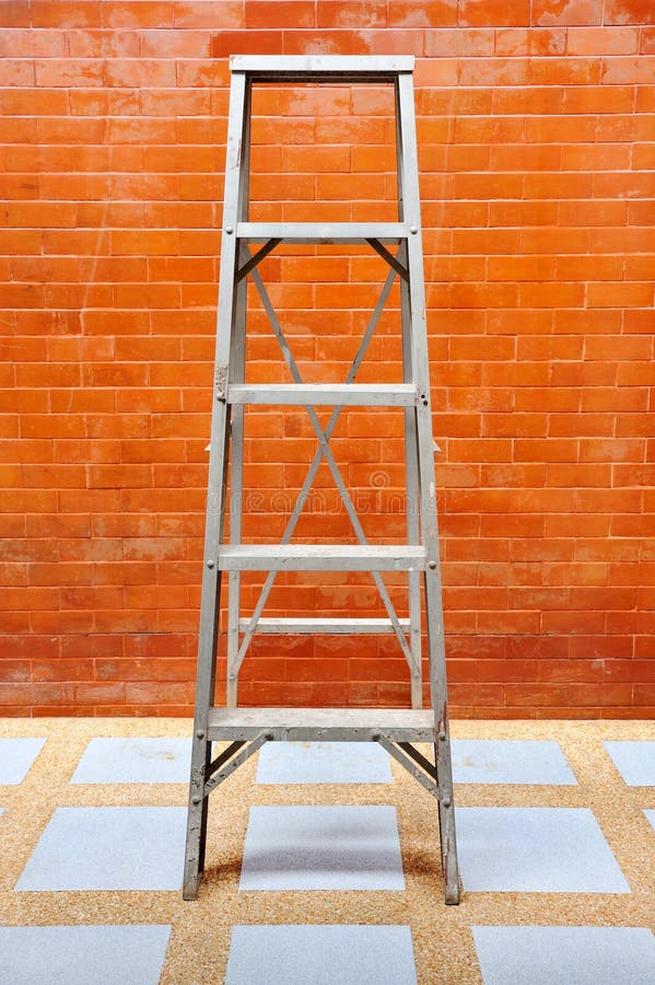 Home Improvement Concept with Ladder and Brick Wall Stock Photo - Image ...