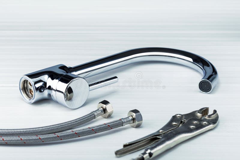 Water Tap and Tool on White Title Surface. Stock Photo - Image of ...