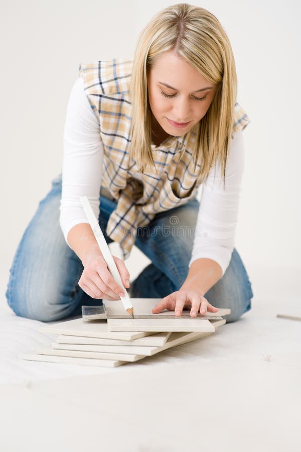 Home Improvement, Renovation - Woman Laying Tile Stock Photo - Image of ...