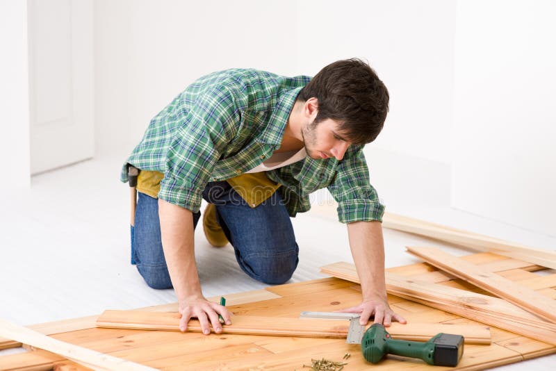 Home Improvement - Man Installing Wooden Floor Stock Image - Image of ...
