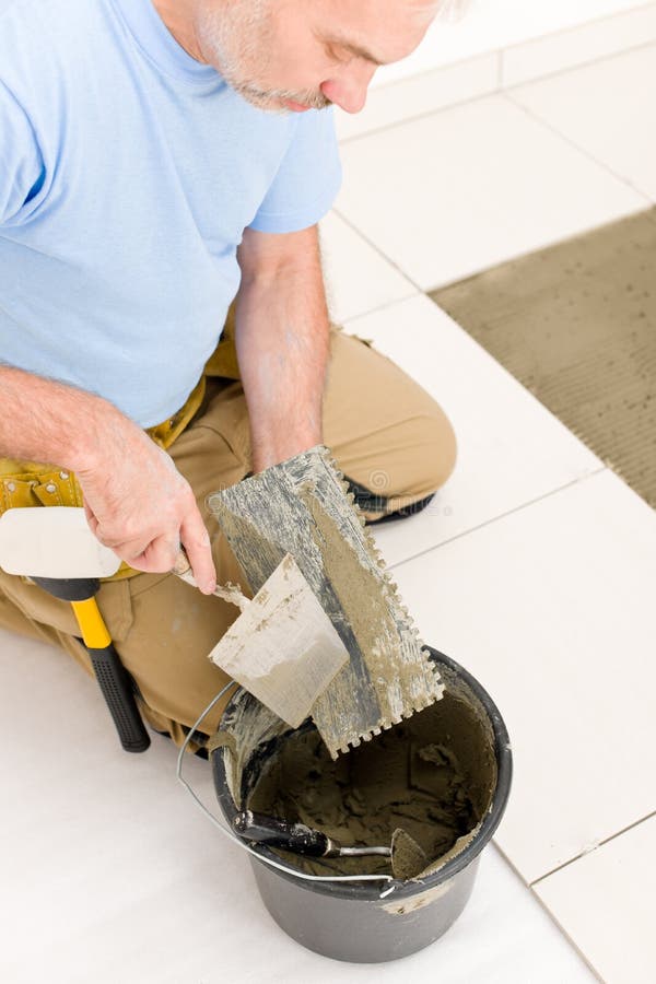Laying Ceramic Tiles stock photo. Image of human, ceramic - 35953568