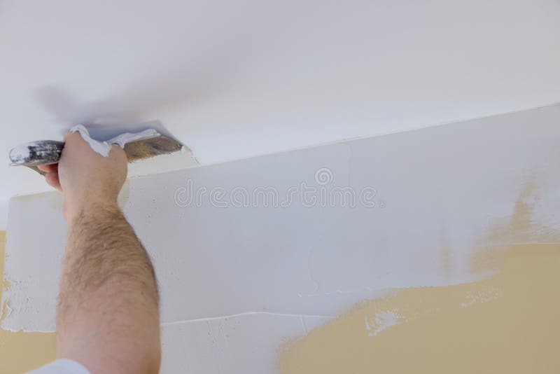 Home Interior Renovation on Plastering Wall Coating Putty Plaster on ...