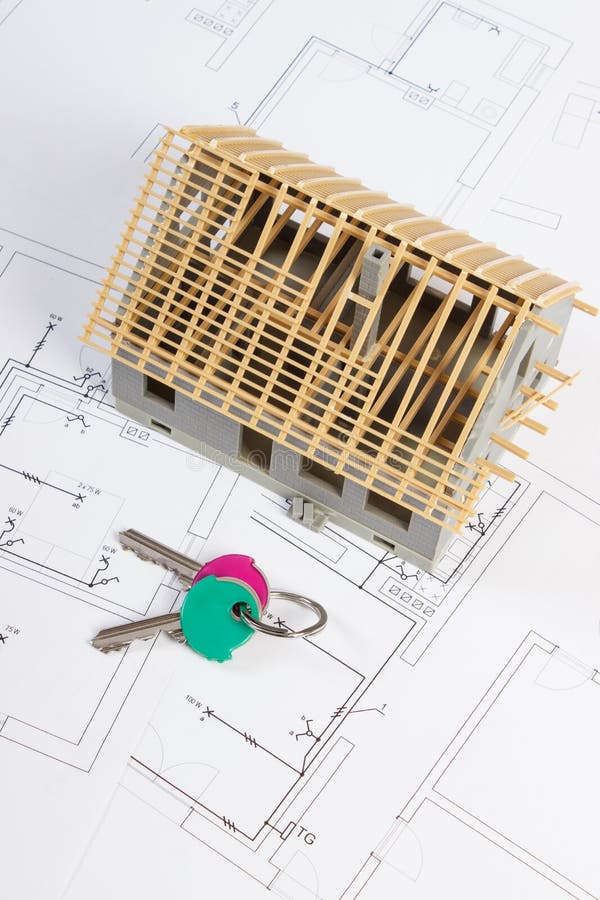Home Keys and Small House Under Construction on Electrical Drawings ...