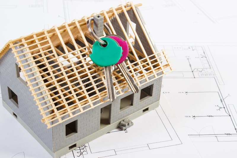 Home Keys and Small House Under Construction on Electrical Drawings ...