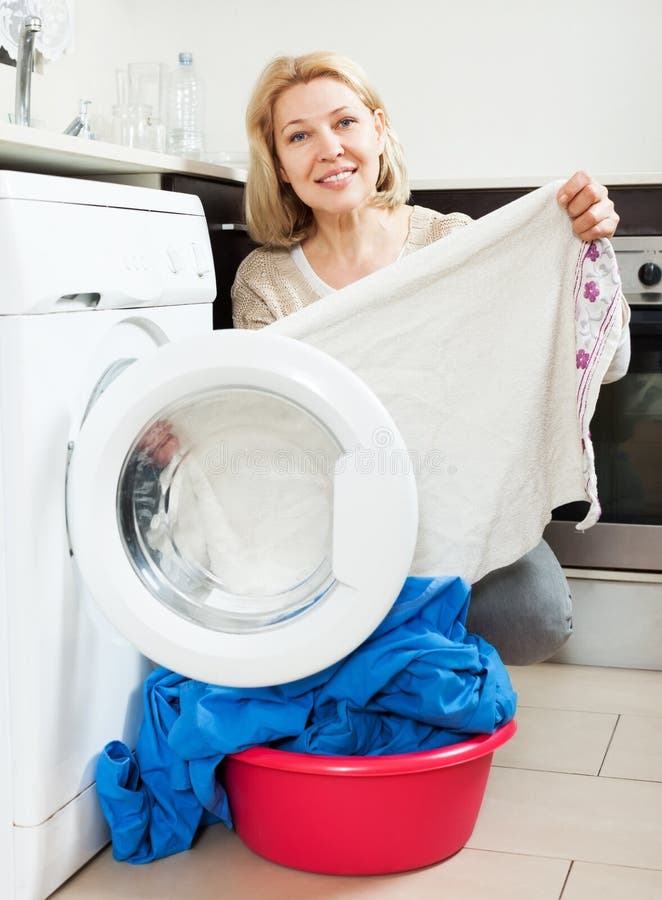 Home Laundry. Woman Using Washing Machine at Home Stock Image - Image ...
